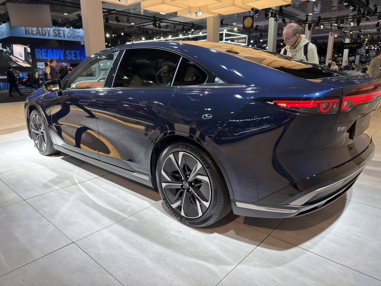 Mazda 6e 2025 Rear and Side View with Sleek Tail Light Design